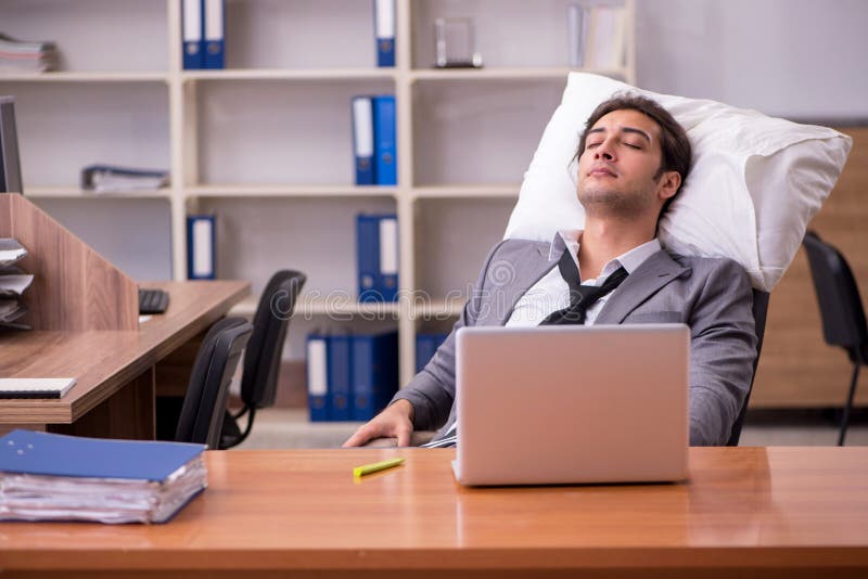 Young Male Employee Sleeping at Workplace Stock Image - Image of ...