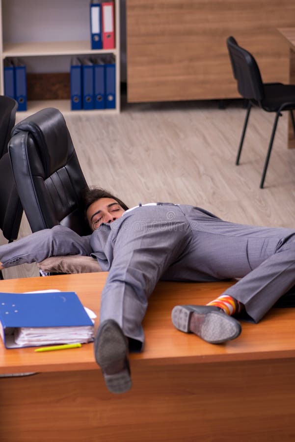 Young Male Employee Sleeping at Workplace Stock Image - Image of ...