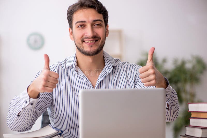 Young Male Employee Student Working in the Office Stock Image - Image ...