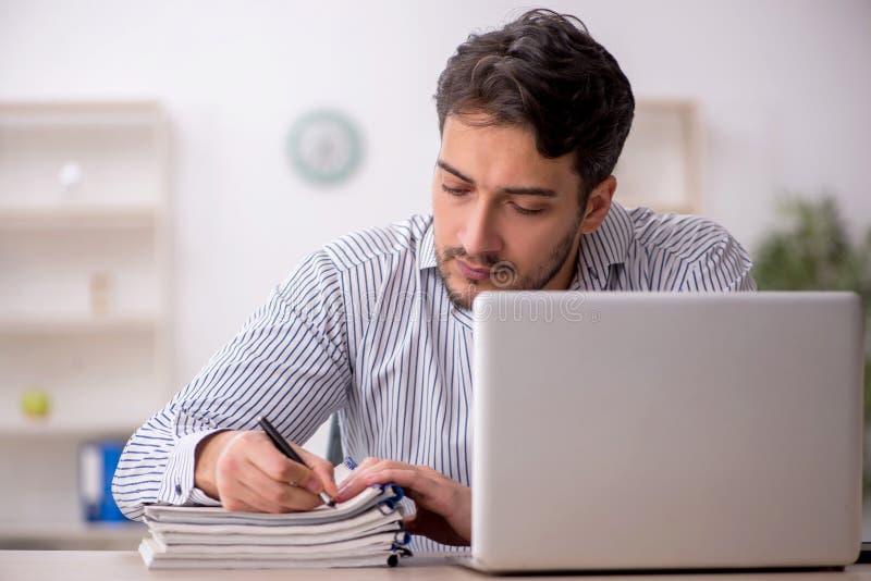 Young Male Employee Student Working in the Office Stock Image - Image ...