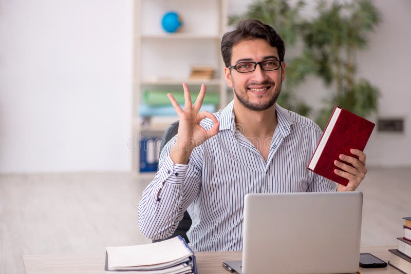 Young Male Employee Student Working in the Office Stock Image - Image ...