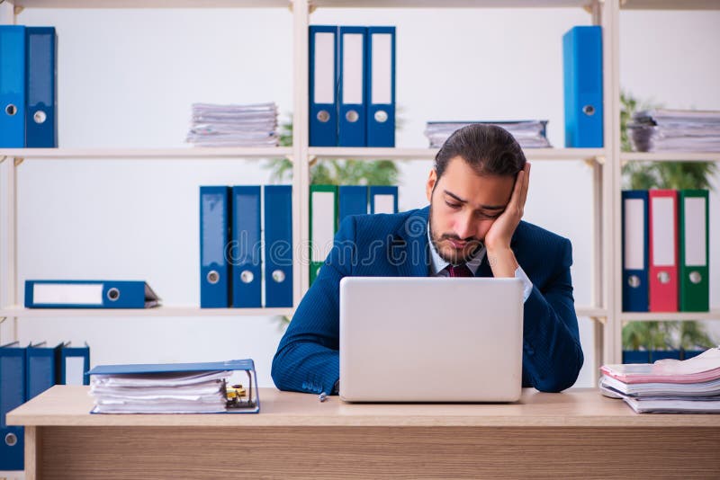Young Male Employee and Too Many Work in the Office Stock Image - Image ...