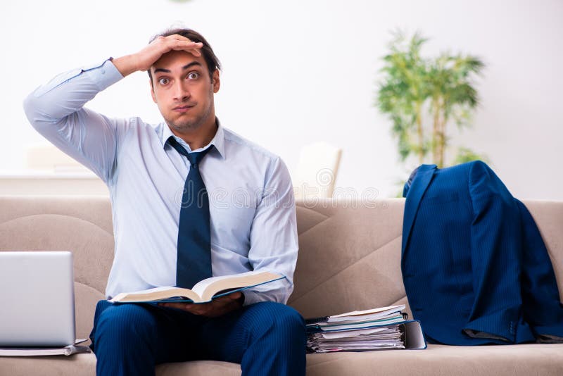 Young Male Employee Working from House Stock Photo - Image of missing ...