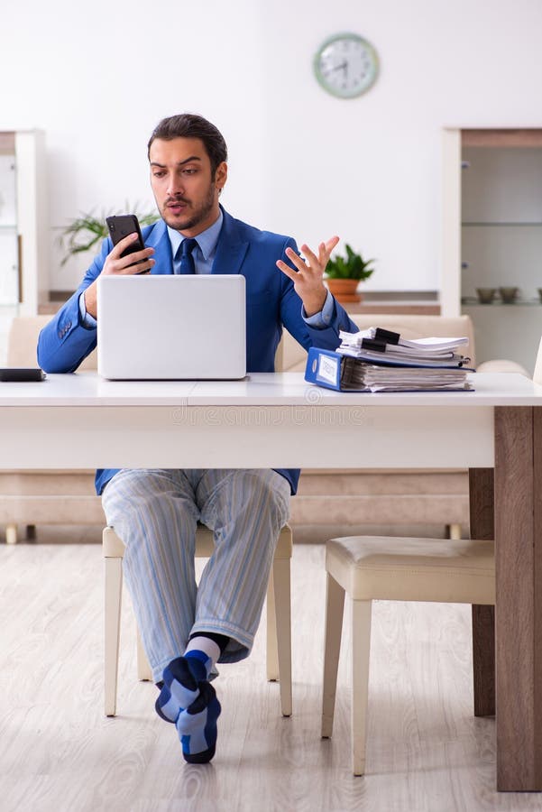 Young Male Employee Working from House in Self-isolation Concept Stock ...