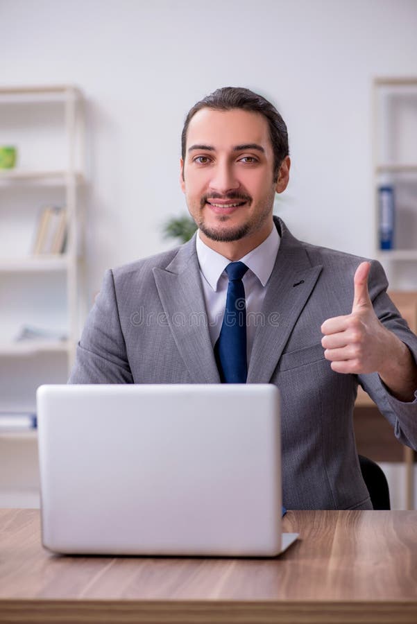 Young Male Employee Working in the Office Stock Photo - Image of ...