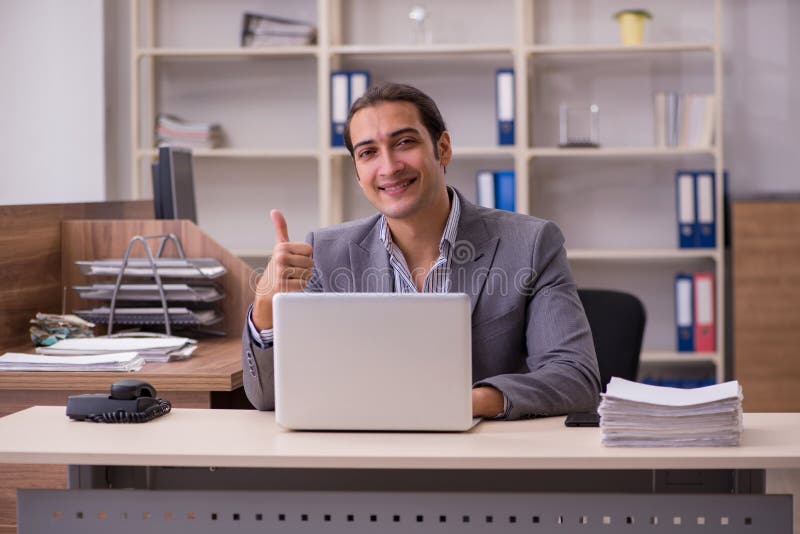 Young Male Employee Working in the Office Stock Photo - Image of ...