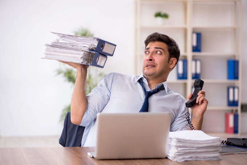 Young Male Employee Working in the Office Stock Image - Image of ...