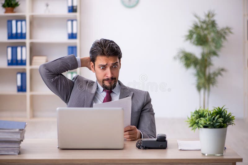 Young Male Employee Working in the Office Stock Photo - Image of office ...
