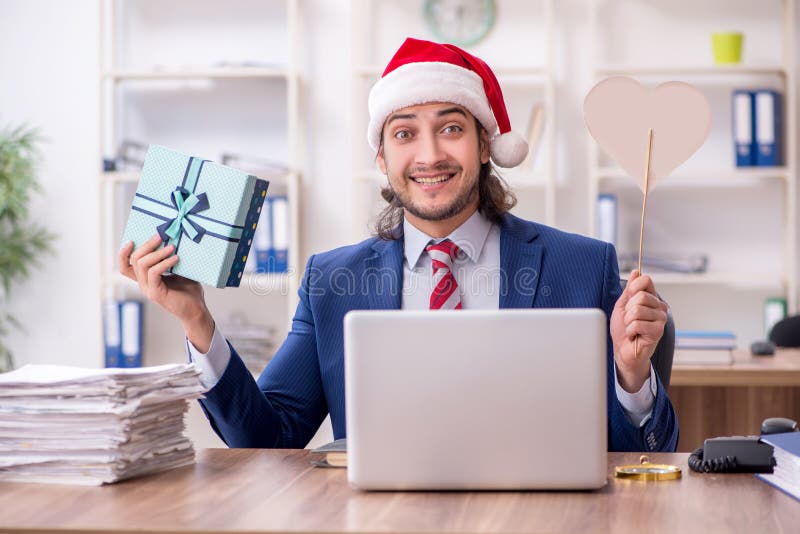 Young Male Employee Working in the Office at Christmas Eve Stock Image ...