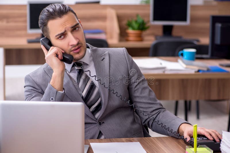 Young Male Employee Working in the Office Stock Photo - Image of hours ...
