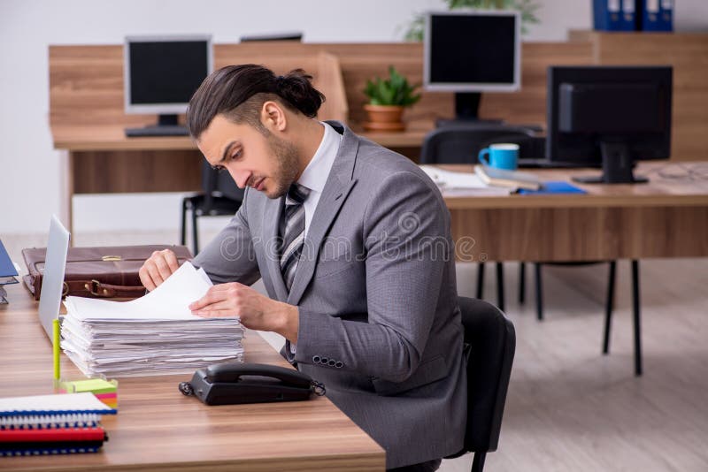 Young Male Employee Working in the Office Stock Image - Image of ...