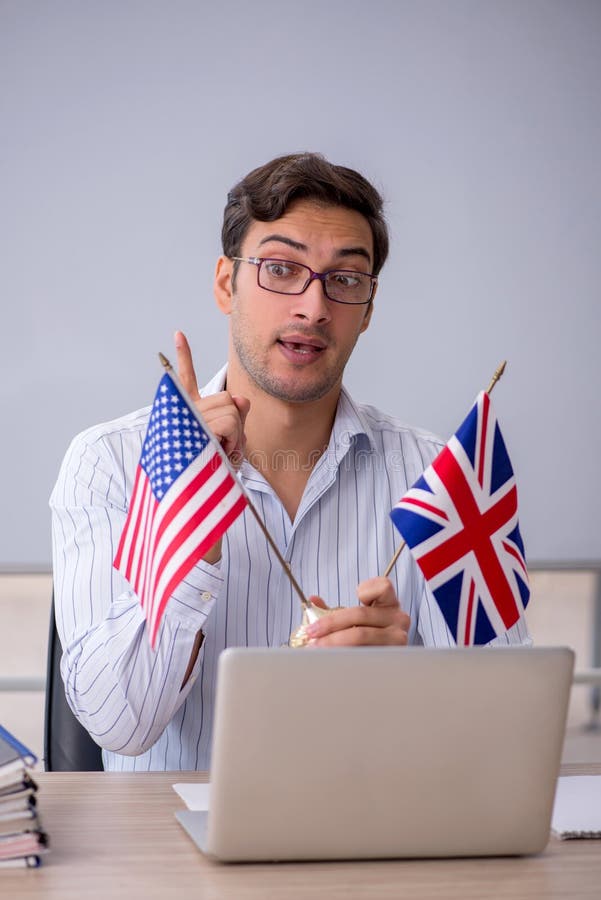 Young Male English Language Teacher in the Classroom Stock Photo ...