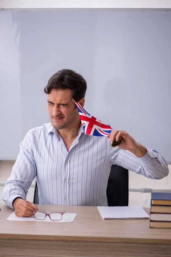 Young Male English Language Teacher in the Classroom Stock Image ...