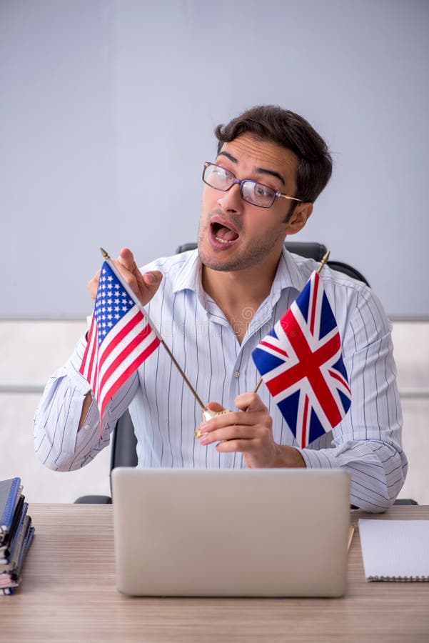 Young Male English Language Teacher in the Classroom Stock Image ...