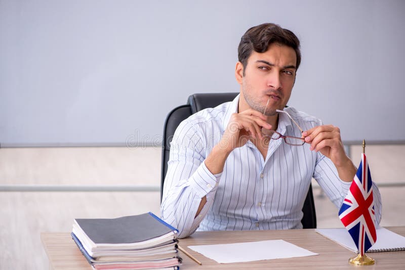 Young Male English Language Teacher in the Classroom Stock Image ...