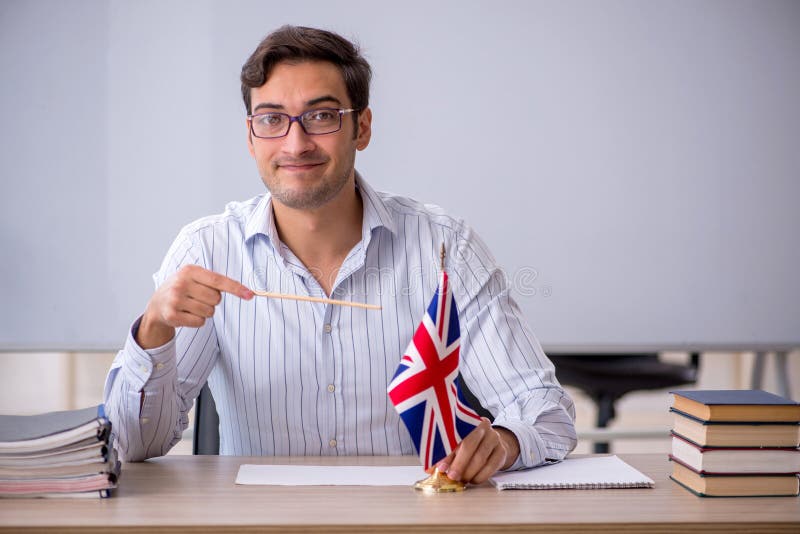 Young Male English Language Teacher in the Classroom Stock Image ...