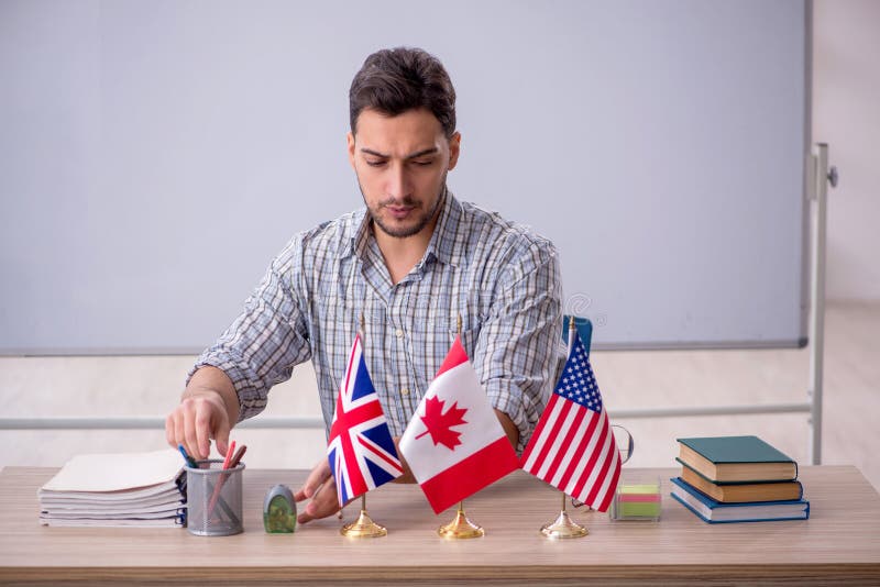 Young Male English Language Teacher in the Classroom Stock Image ...