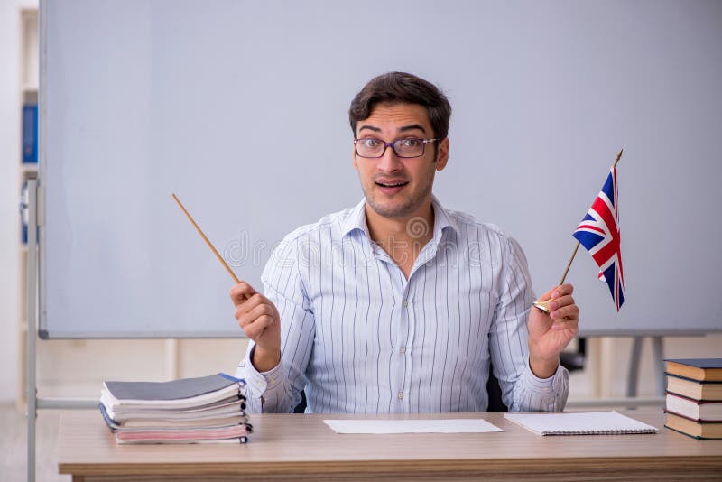 Young Male English Language Teacher in the Classroom Stock Image ...