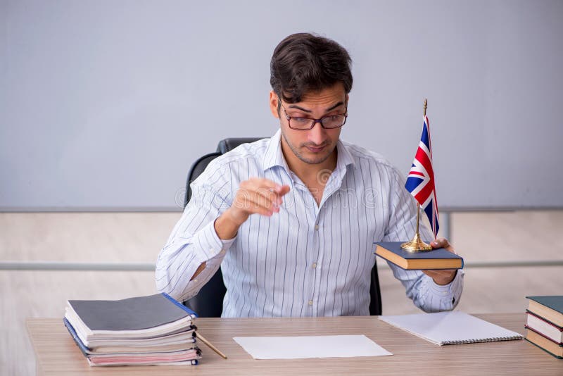 Young Male English Language Teacher in the Classroom Stock Image ...