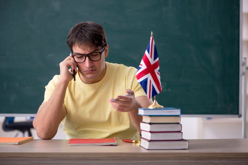 Young Male English Language Teacher in the Classroom Stock Image ...