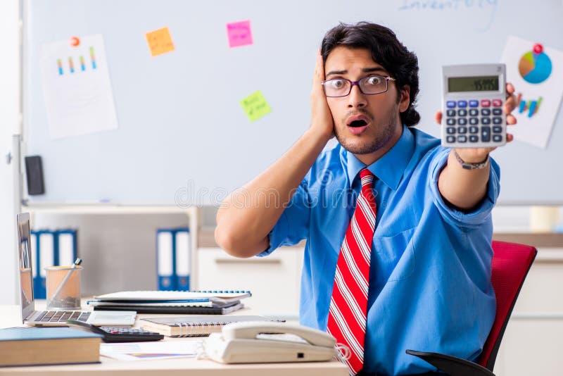 The Young Male Financial Manager Working in the Office Stock Image ...