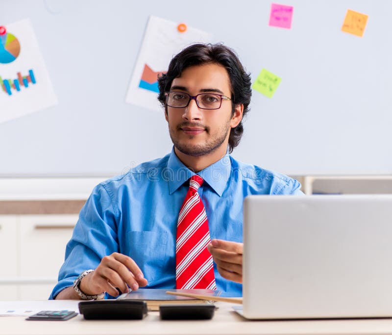 Young Male Financial Manager Working in the Office Stock Photo - Image ...
