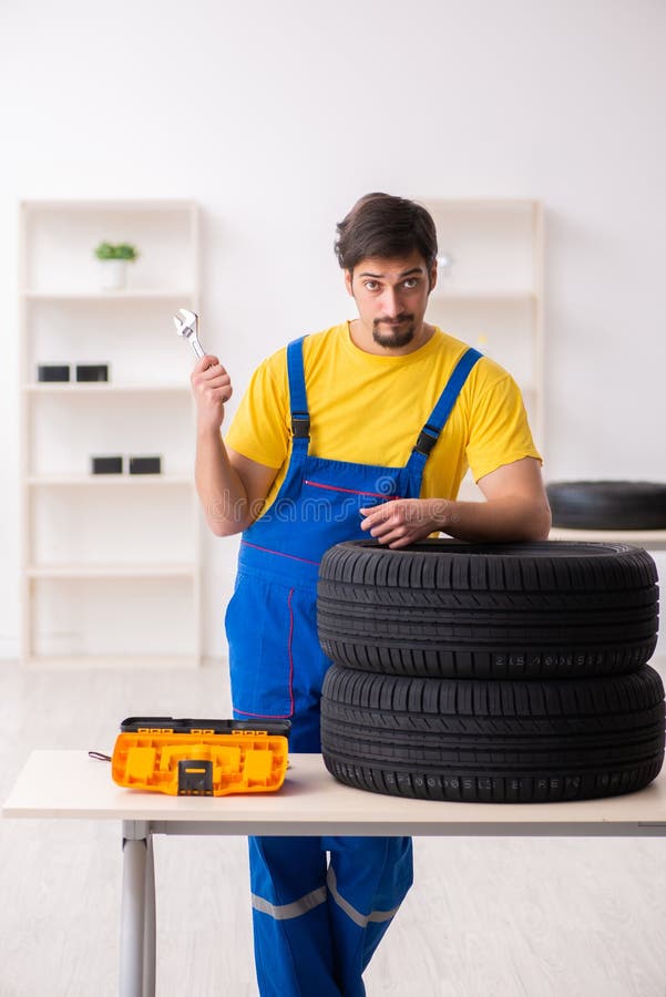 1,066 Young Male Garage Worker Tyre Workshop Stock Photos - Free ...