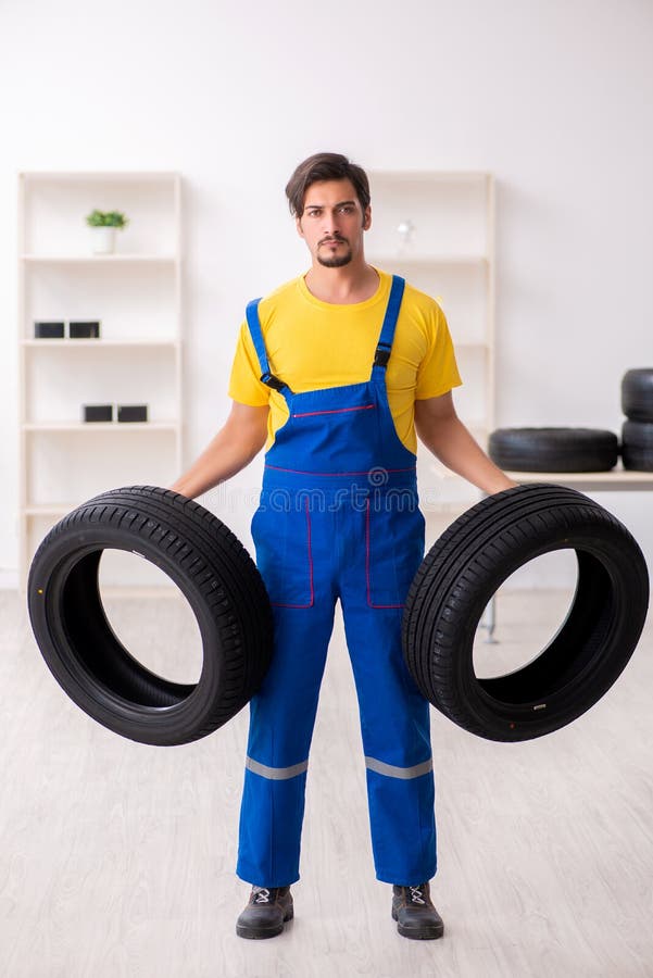 1,066 Young Male Garage Worker Tyre Workshop Stock Photos - Free ...