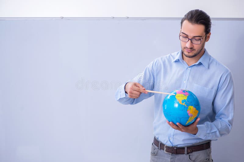 Young Male Geography Teacher in Front of Whiteboard Stock Photo - Image ...