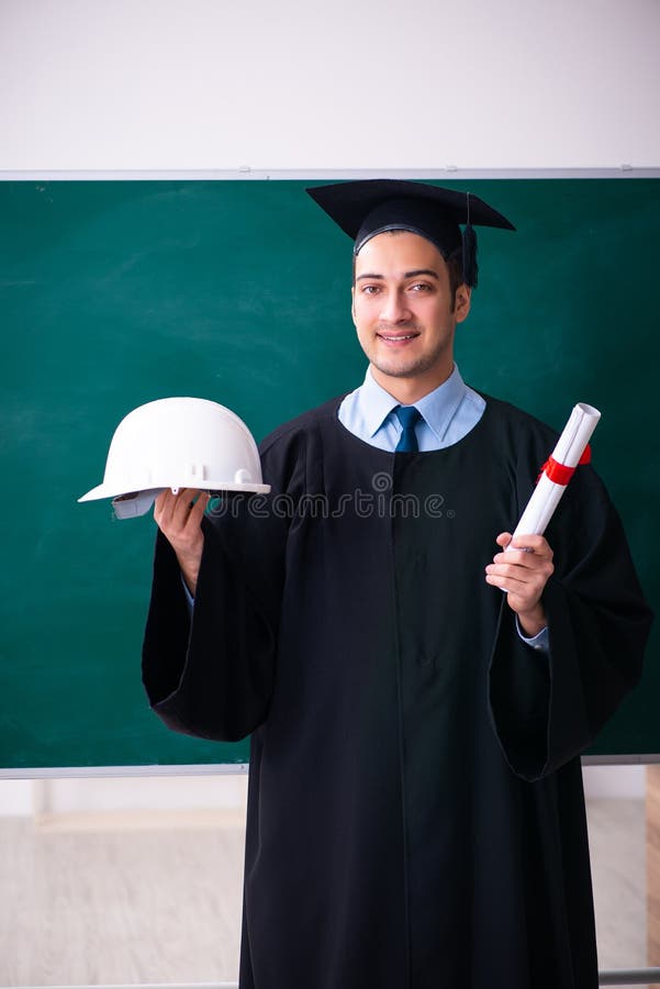Young Male Graduate in Front of Board Stock Photo - Image of blackboard ...