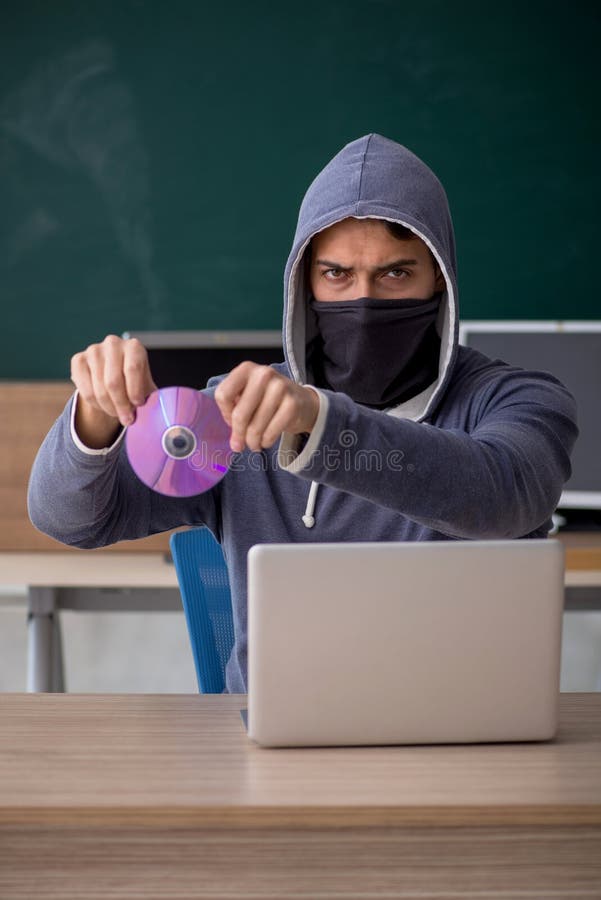 Young Male Hacker Sitting in the Classroom Stock Image - Image of ...