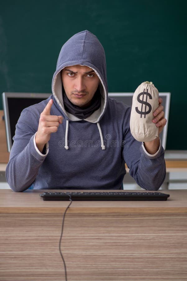 Young Male Hacker Sitting in the Classroom Stock Image - Image of young ...