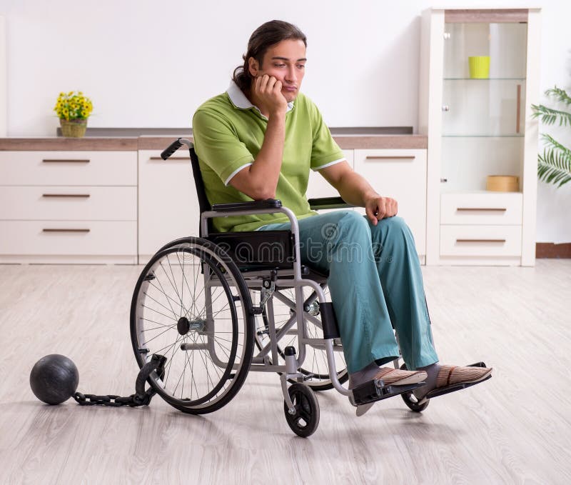 Young Male Invalid in Wheel-chair Suffering at Home Stock Image - Image ...
