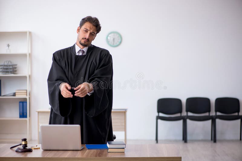 Young Male Judge in Corruption Concept Stock Photo - Image of justice ...