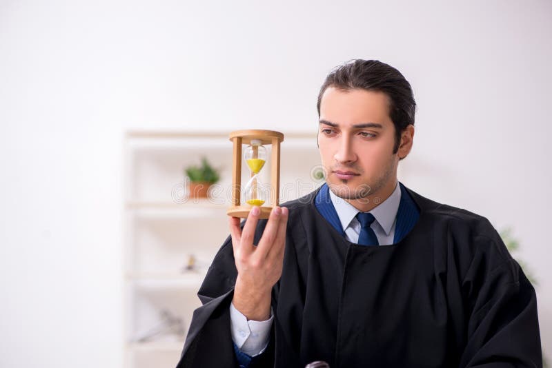 Young Male Judge in Time Management Concept Stock Photo - Image of ...