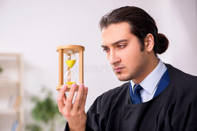 Young Male Judge in Time Management Concept Stock Photo - Image of ...