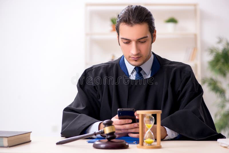 Young Male Judge in Time Management Concept Stock Photo - Image of ...