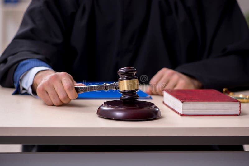 Young Male Judge Working in Courthouse Stock Photo - Image of gavel ...