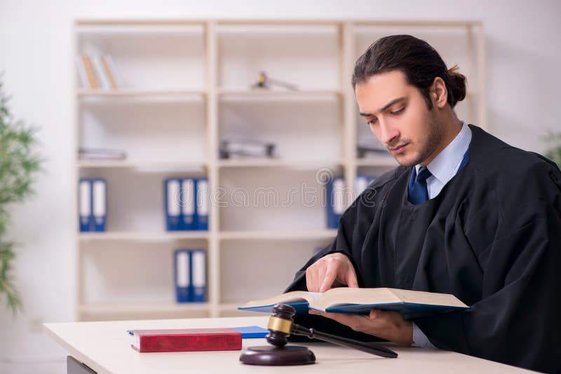 Young Male Judge Working in Courthouse Stock Image - Image of holding ...