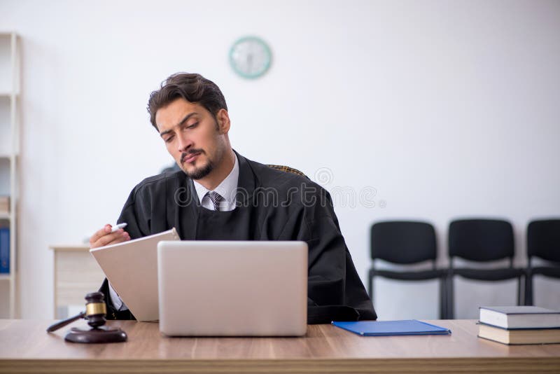 Young Male Judge Working in the Courthouse Stock Image - Image of ...