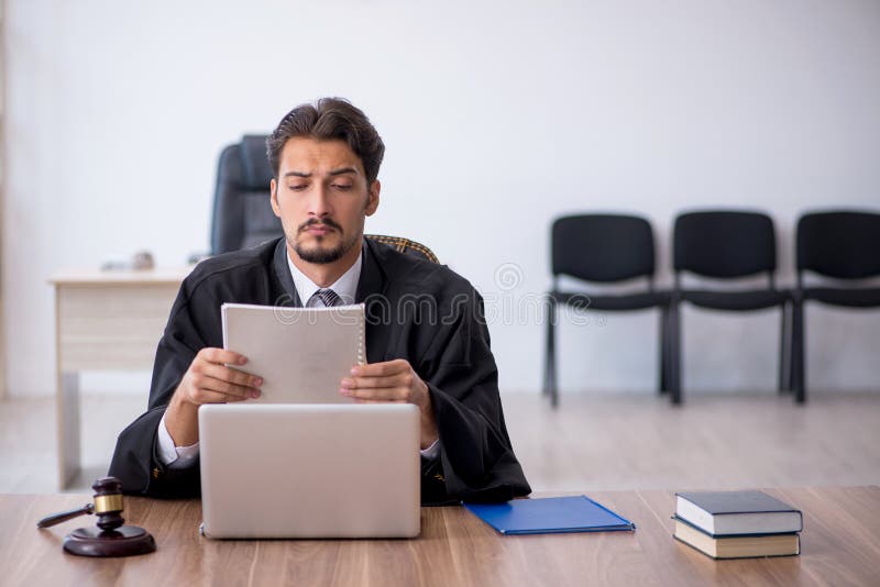 Young Male Judge Working in the Courthouse Stock Photo - Image of gavel ...