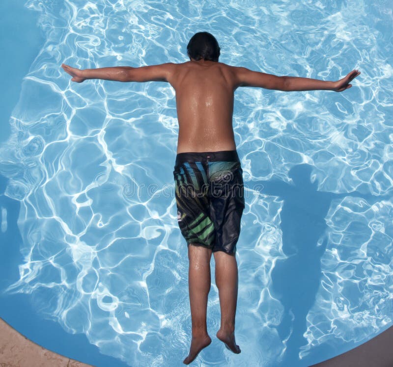 Jumping to pool stock photo. Image of jump, garden, splatter - 15400112