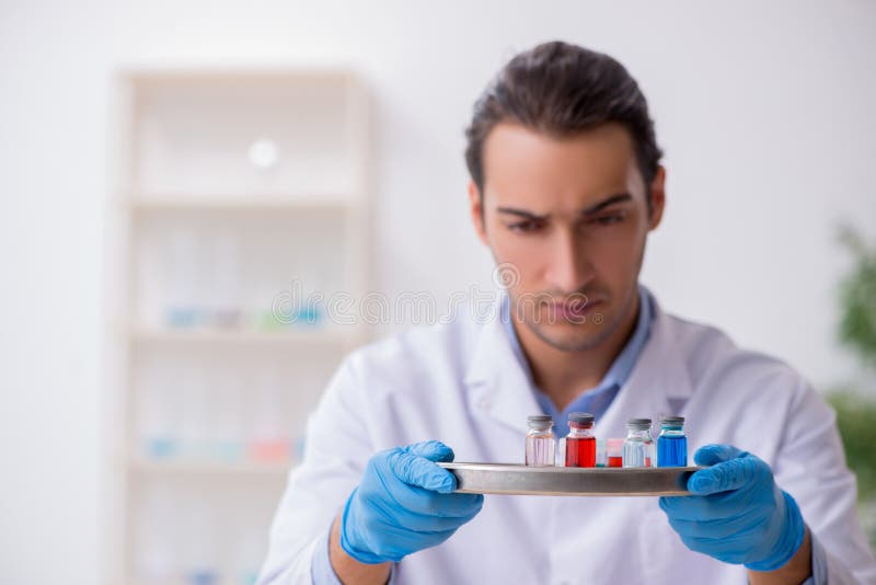 Young Male Lab Assistant in Drug Synthesis Concept Stock Image - Image ...