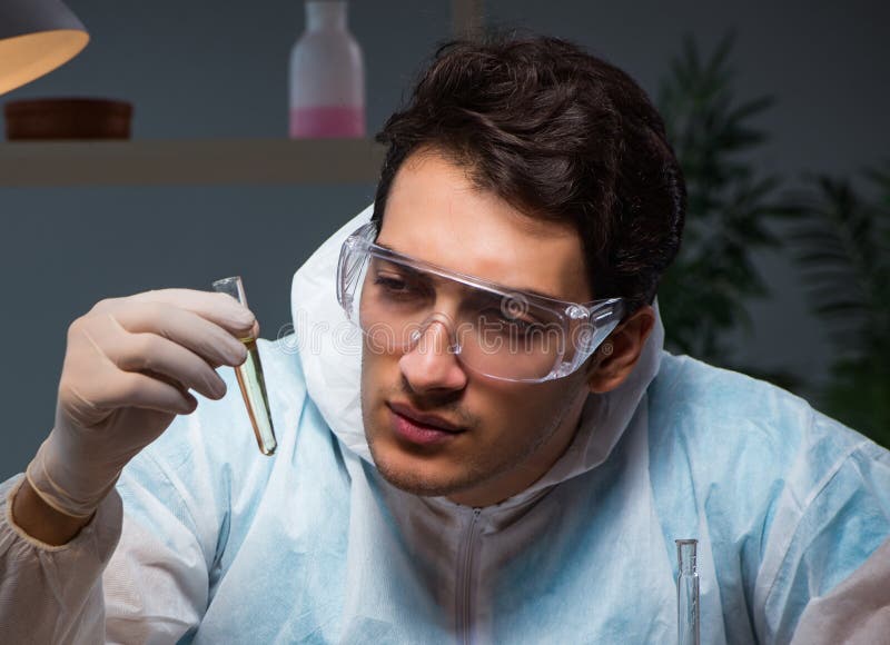 Young Male Lab Chemist Late at Night in Overtime Time Stock Photo ...