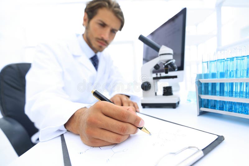 Scientist Makes a Note of Experiment in the Laboratory Stock Image ...