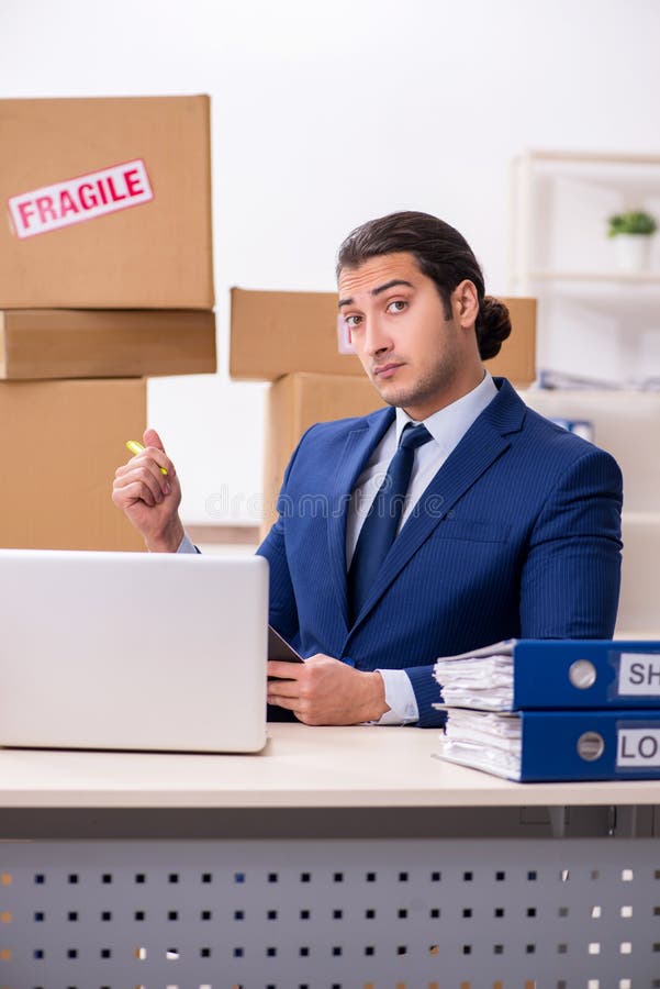 Young Male Logistics Specialist Working in the Office Stock Photo ...