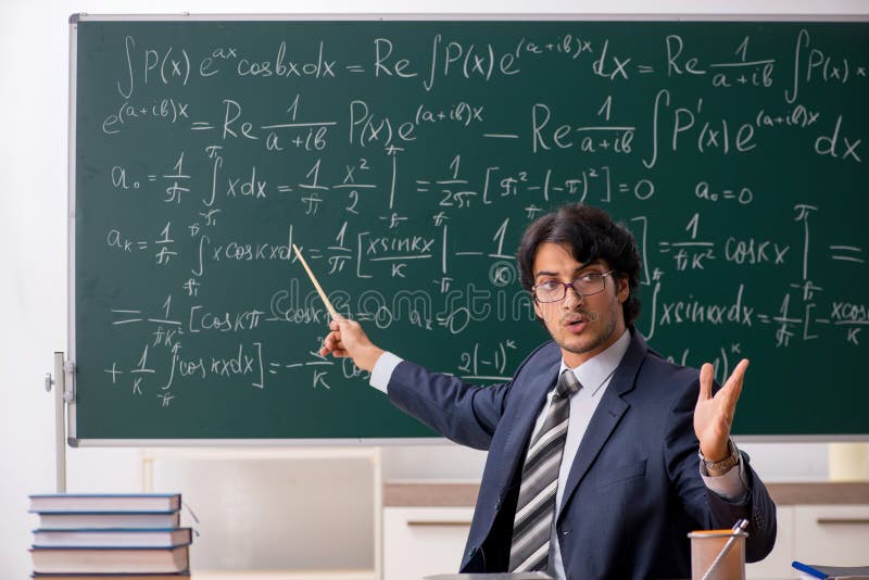 The Young Male Math Teacher in Classroom Stock Image - Image of ...