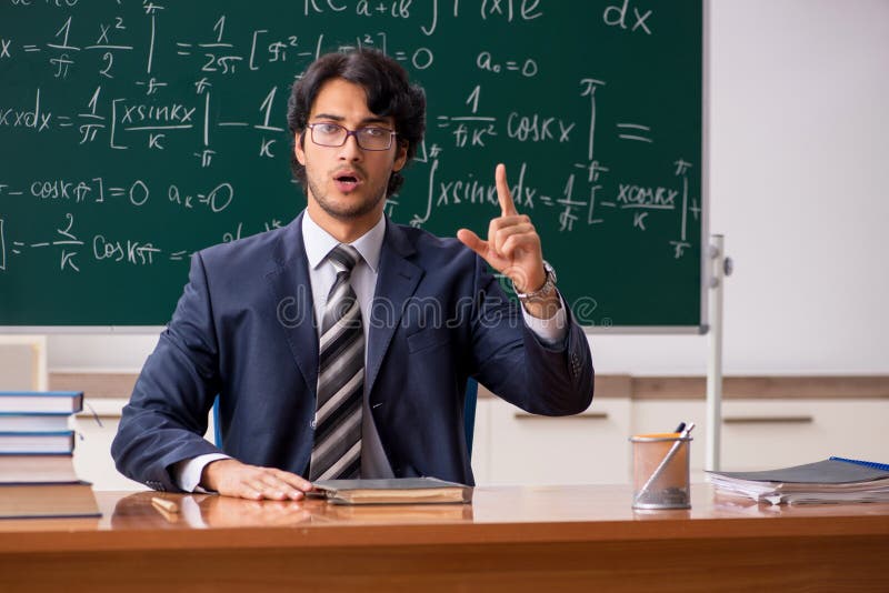 The Young Male Math Teacher in Classroom Stock Photo - Image of ...