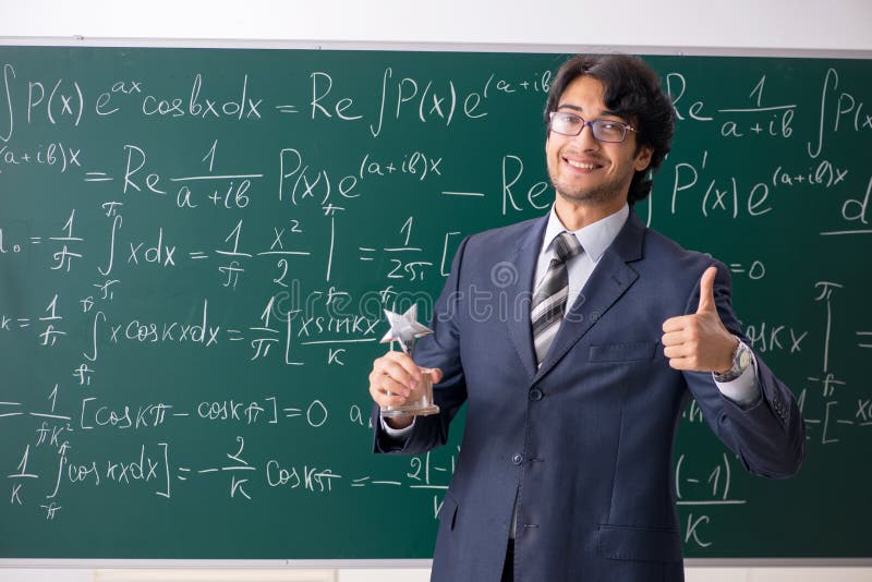 The Young Male Math Teacher in Classroom Stock Photo - Image of ...
