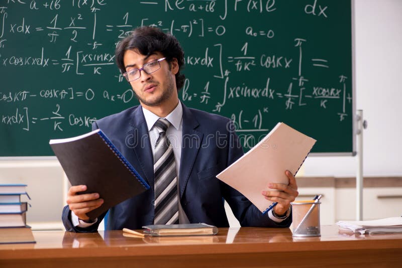 The Young Male Math Teacher in Classroom Stock Image - Image of math ...